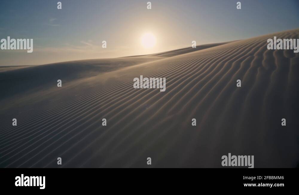 Cinematic Footage of Dune in Desert With Wind Moving Sand Over Hills ...