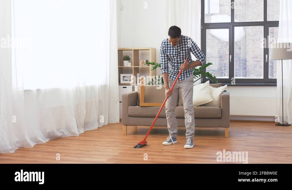 Man cleaning home broom Stock Videos & Footage - HD and 4K Video Clips ...