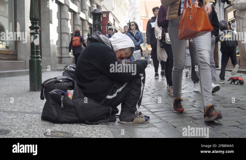 Walking by homeless man sitting Stock Videos & Footage - HD and 4K ...