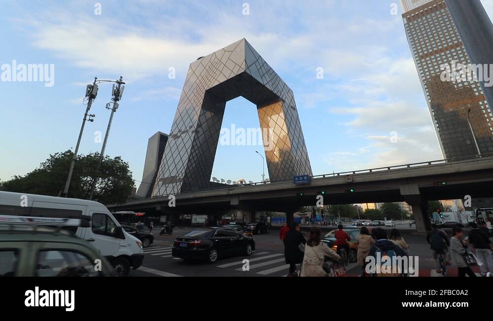 Slow Motion- Busy Beijing traffic in front of the L-shaped Rem Koolhaas ...