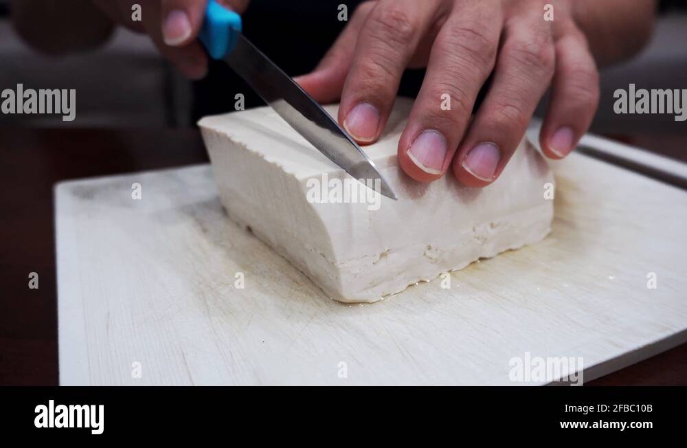 Cutting tofu Stock Videos & Footage - HD and 4K Video Clips - Alamy