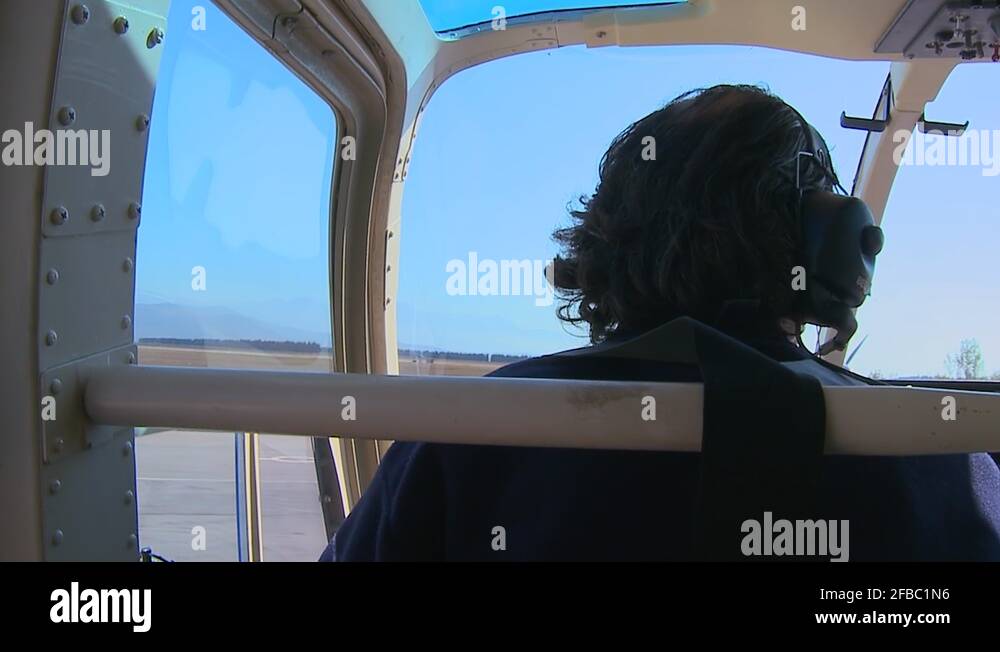 Helicopter ride, cockpit view. The pilot manages a private helicopter ...