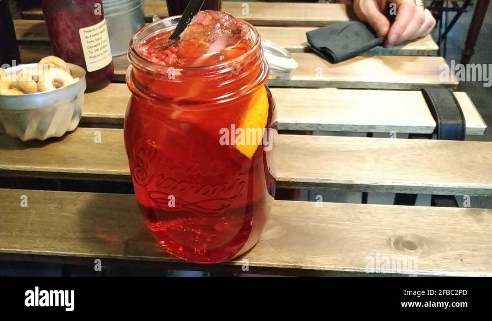 A spritz in a special version, served in a glass jar for the preserve ...