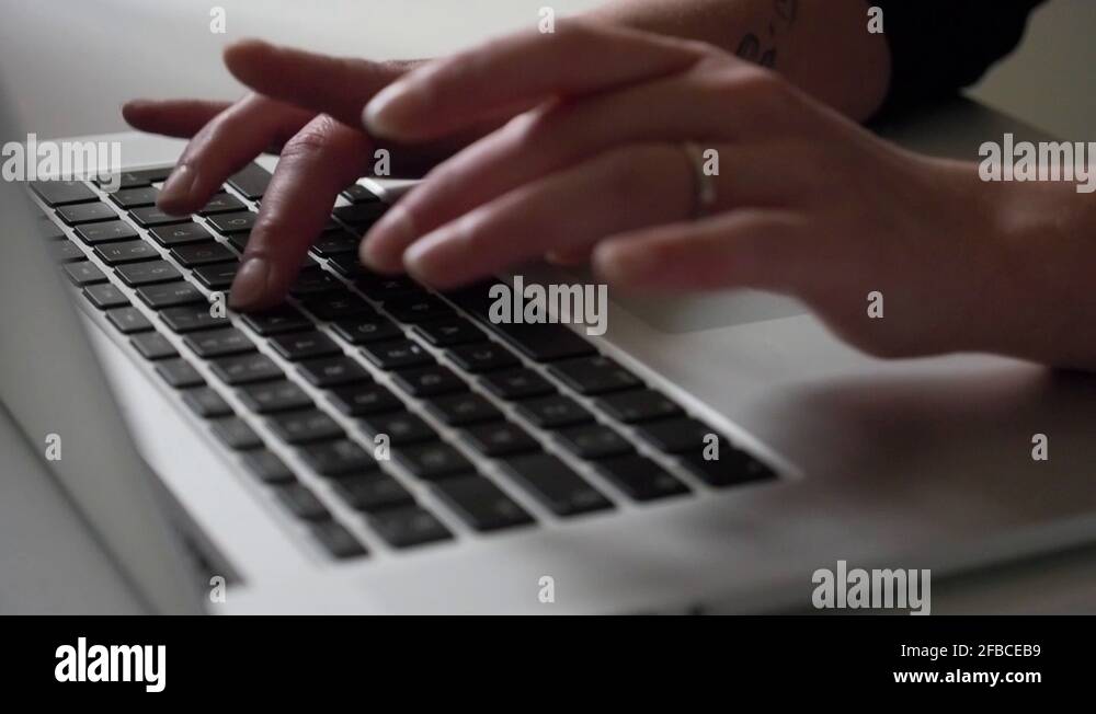 Girl Working with Laptop. Closeup Side View Shoot of Female Hands ...