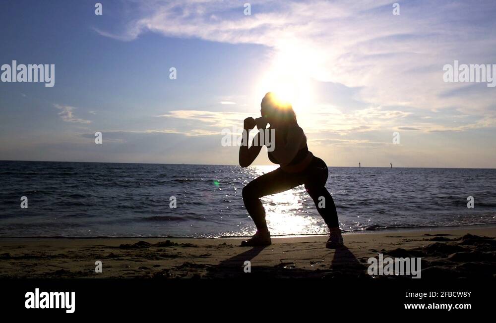 Girl jumping sky ocean in Stock Videos & Footage - HD and 4K Video ...