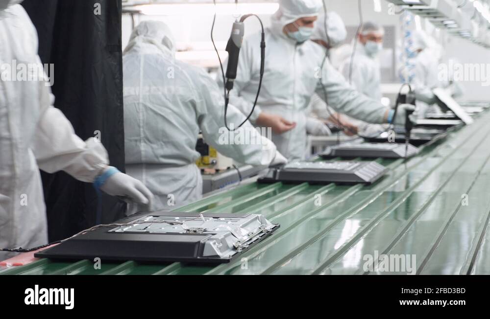 Innovative production of TVs, view of the assembly line, workers Stock ...