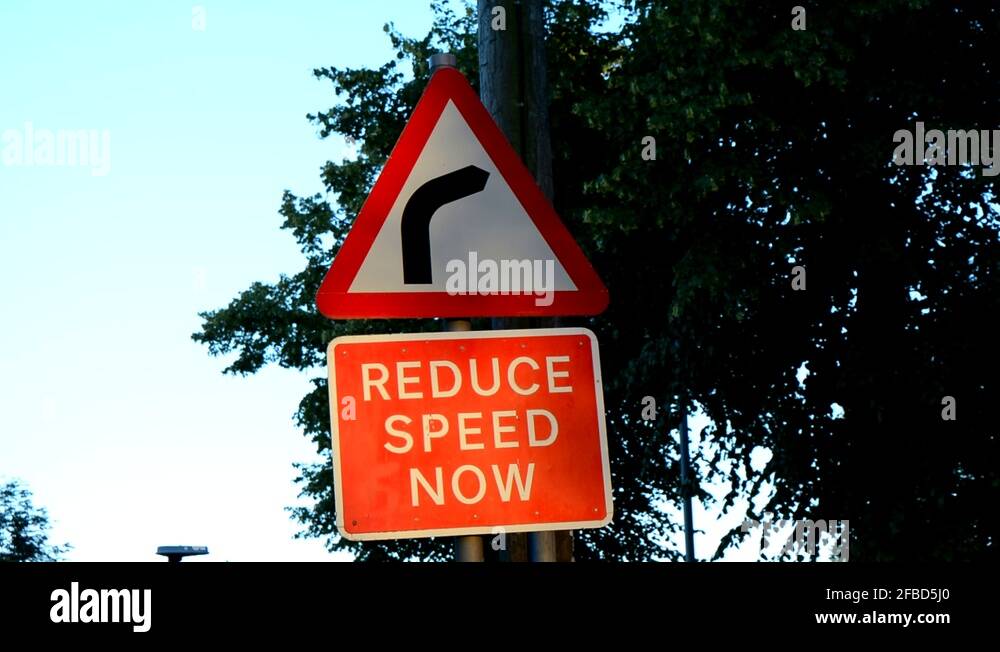 Reduce travel sign Stock Videos & Footage - HD and 4K Video Clips - Alamy