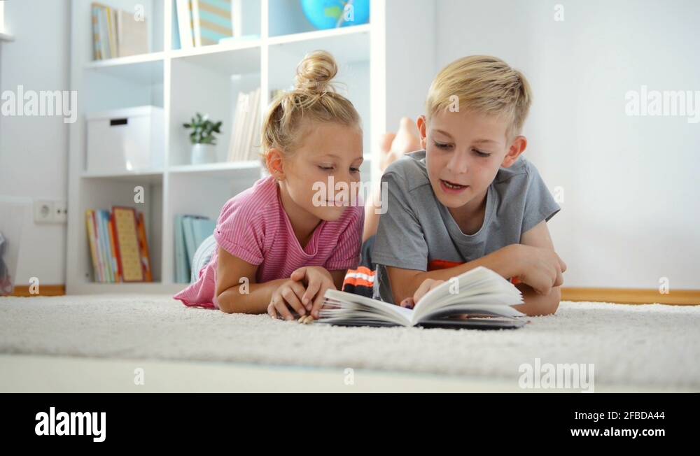 Happy children reading Stock Videos & Footage - HD and 4K Video Clips ...