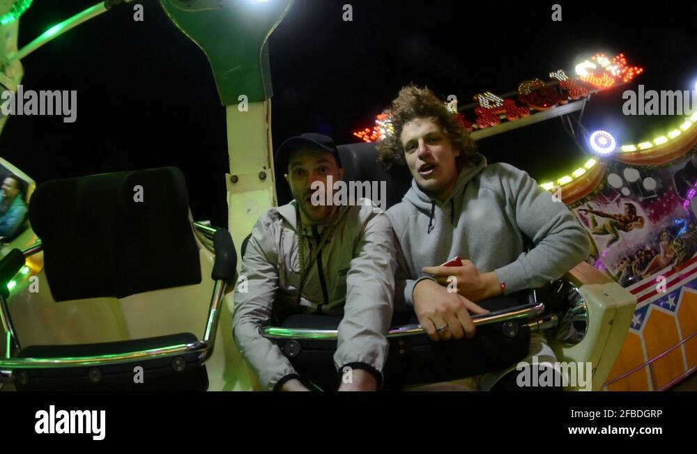 Men ride carousel Stock Videos & Footage - HD and 4K Video Clips - Alamy