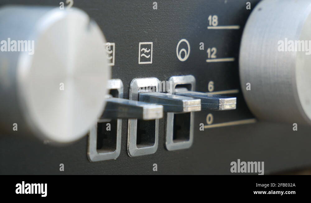 Press a button on a vintage tape recorder, amplifier. Close-up Stock ...
