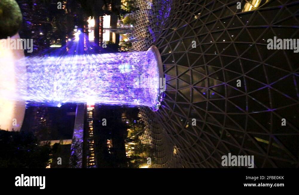 Wide vertical shot of HSBC rain vortex light show at Jewel Changi ...
