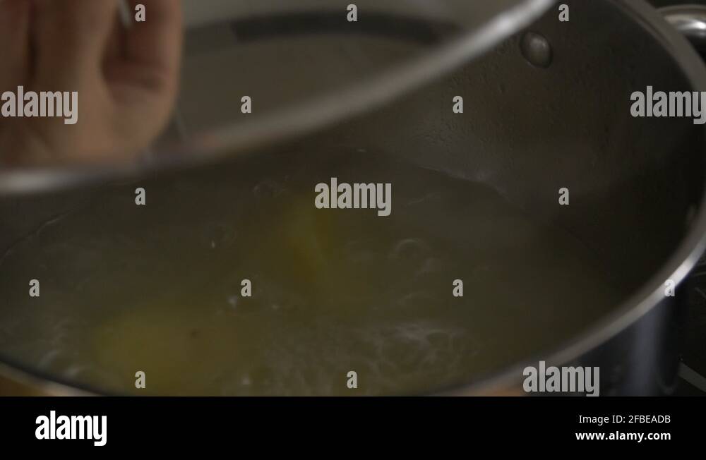 Opening the lid on a boiling pot Stock Videos & Footage - HD and 4K ...