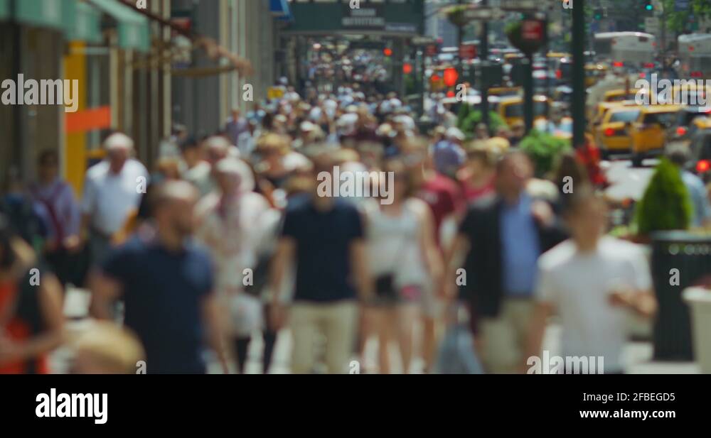 Crowd of people walking street slow motion backlit New York City slow ...