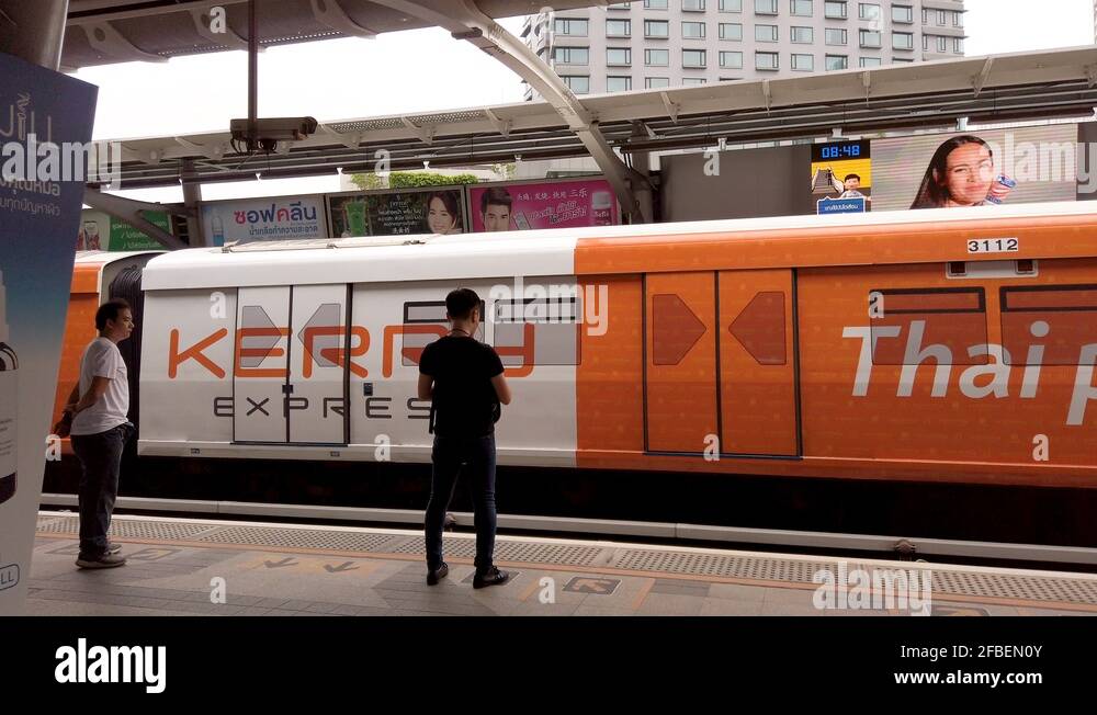 Kerry Express signs on side of the BTS train in Bangkok Thailand Stock ...