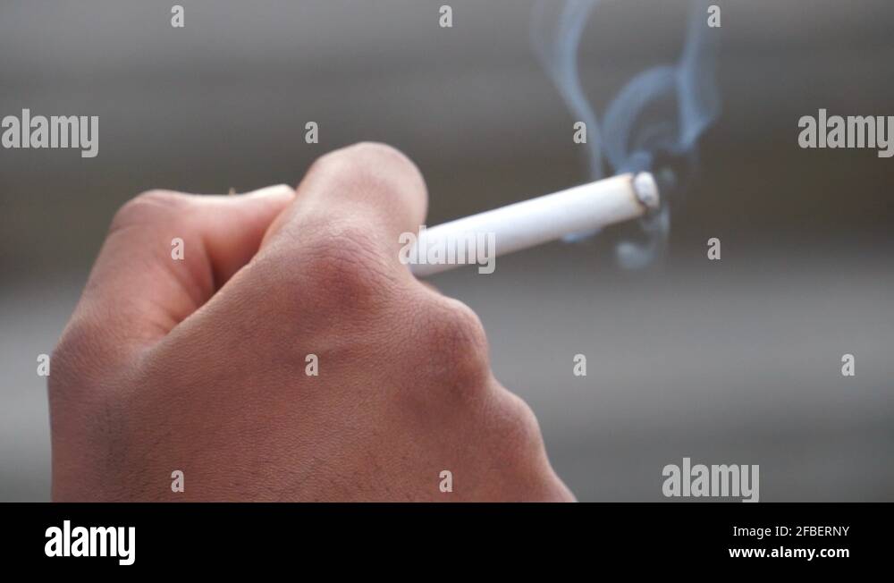 Lighted cigarette Stock Videos & Footage - HD and 4K Video Clips - Alamy