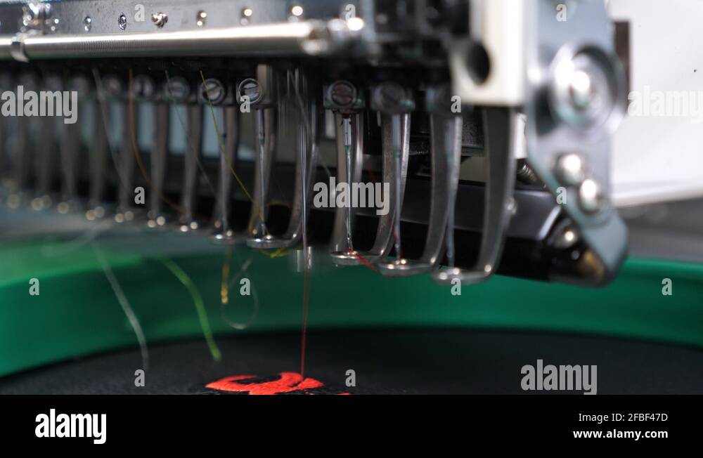 Robot sewing machine. automatic sewing machine. an automated machine ...