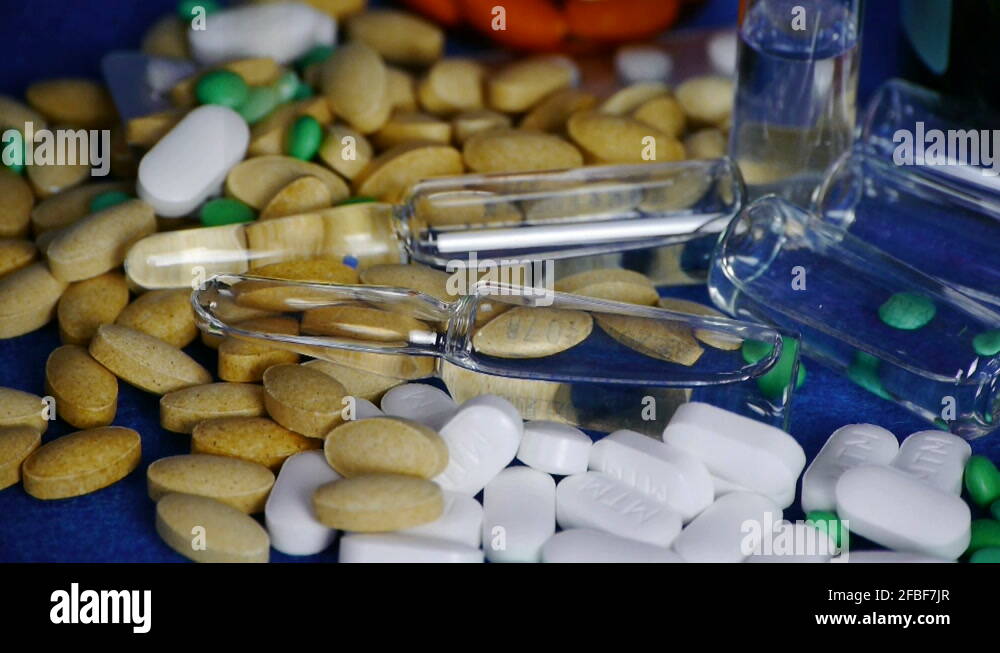 Syringe and capsules Stock Videos & Footage - HD and 4K Video Clips - Alamy