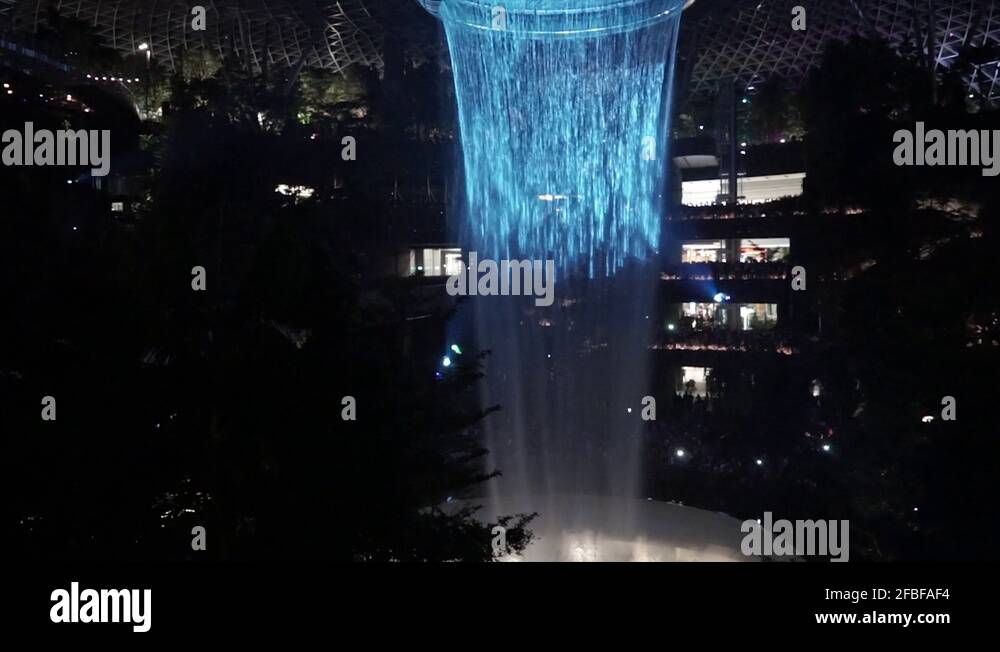 Jewel Changi Airport – HSBC Rain Vortex Light Show Stock Video Footage ...