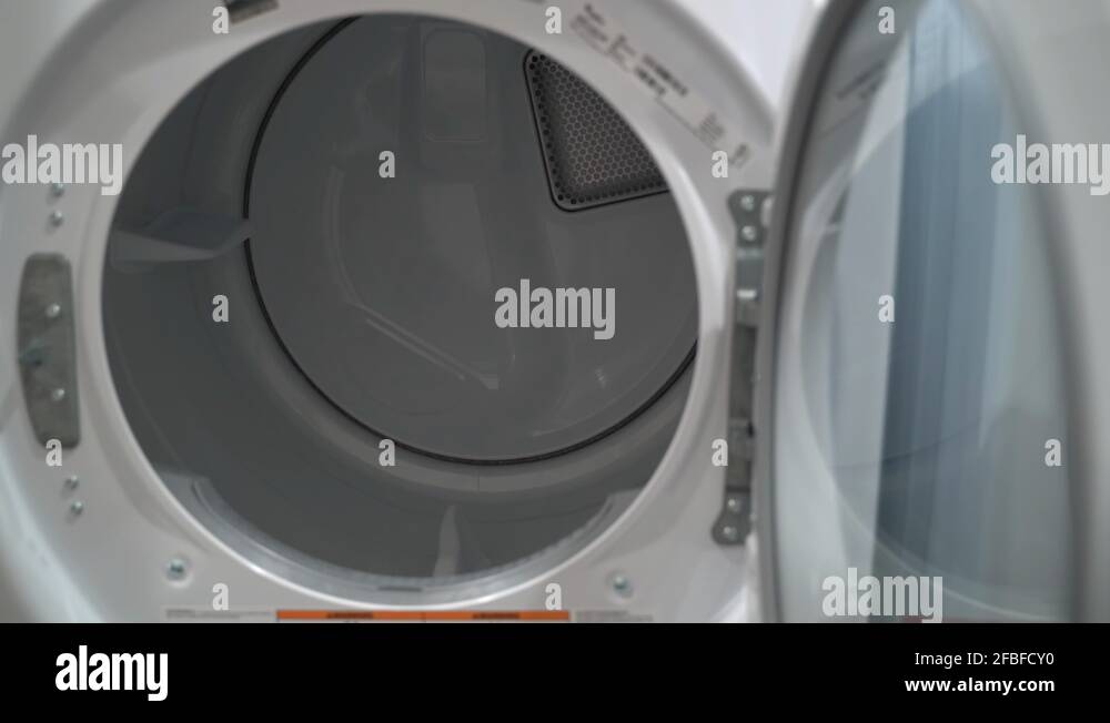 Loading a tumble dryer Stock Videos & Footage - HD and 4K Video Clips ...