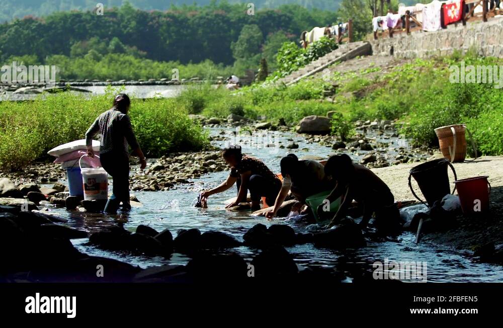 Women washing in river Stock Videos & Footage - HD and 4K Video Clips ...