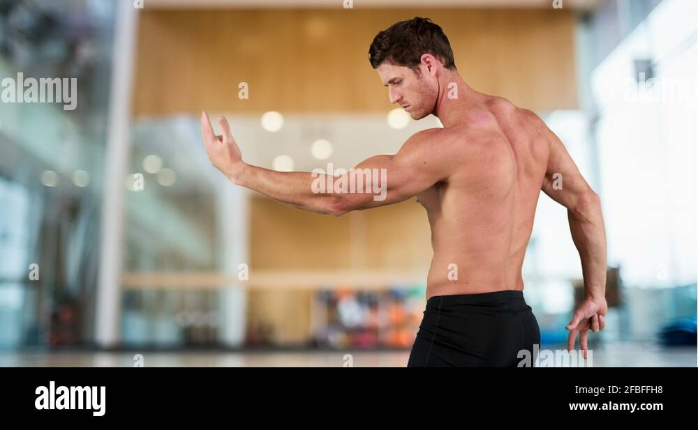 Man flexing biceps Stock Videos & Footage - HD and 4K Video Clips - Alamy