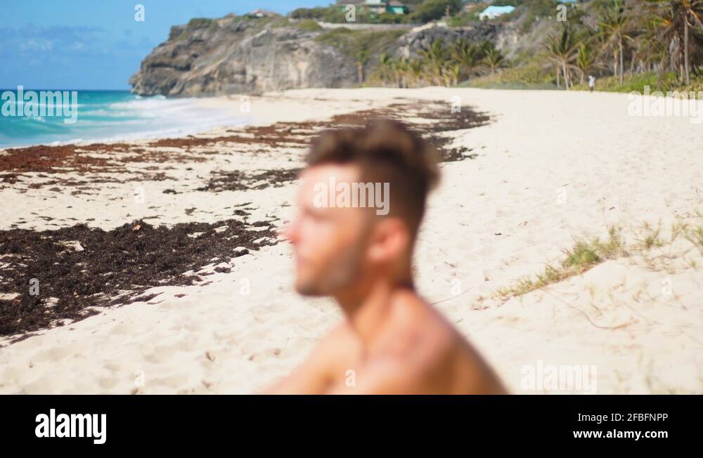 Man on beach in barbados Stock Videos & Footage - HD and 4K Video Clips ...