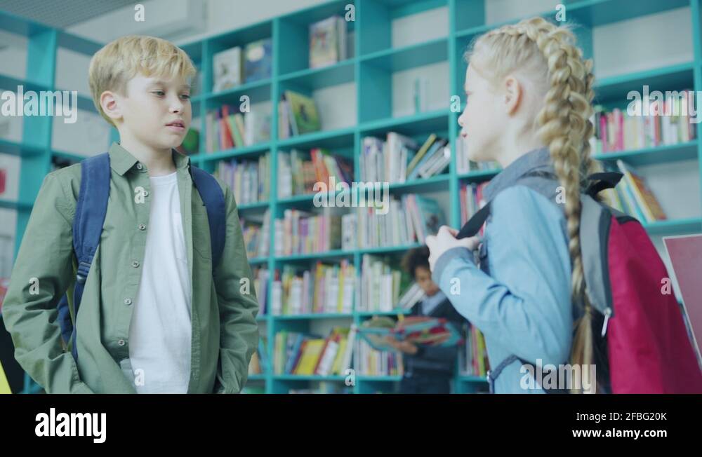 Boy and girl talking standing Stock Videos & Footage - HD and 4K Video ...