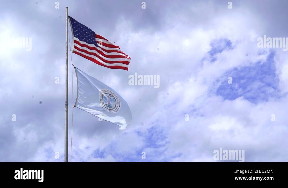 American flag and Virginia Beach flag in the wind Stock Video Footage ...