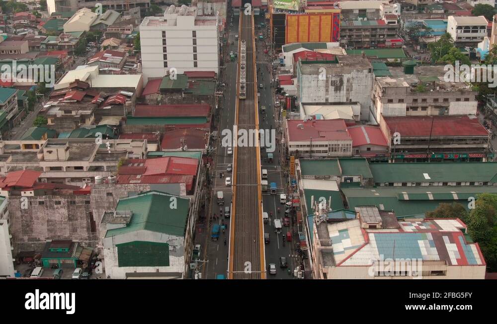 LRT train with traffic in manila droneshot 4k 30fps Stock Video Footage ...
