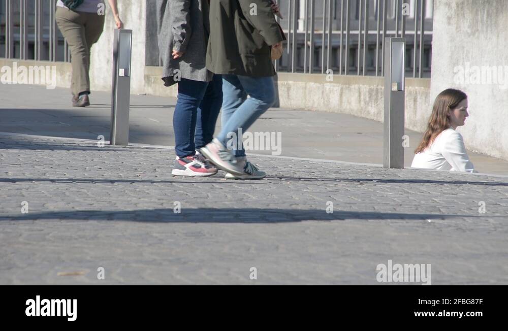 Girl walking on pavement Stock Videos & Footage - HD and 4K Video Clips ...