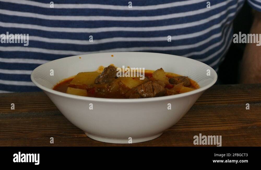 Eating stew Stock Videos & Footage - HD and 4K Video Clips - Alamy