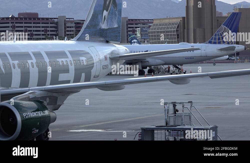 Frontier Airlines plane backing out of terminal gate 4k Stock Video ...