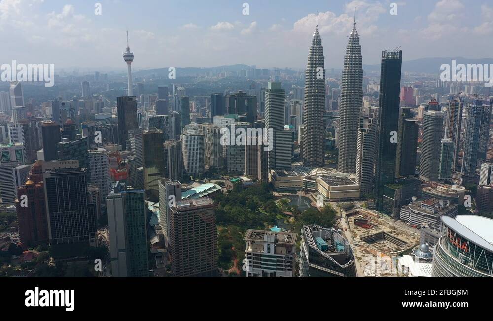 sunny day kuala lumpur downtown towers topscape aerial panorama 4k ...