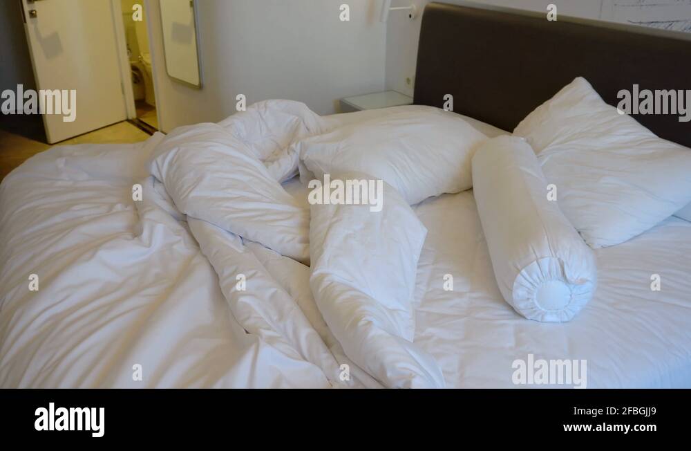 Messy hotel bed Stock Videos & Footage - HD and 4K Video Clips - Alamy
