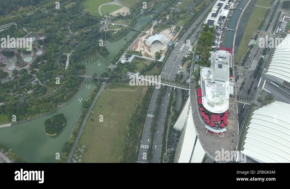 4K Aerial view of Marina Bay Sands and Gardens by The Bay in downtown ...
