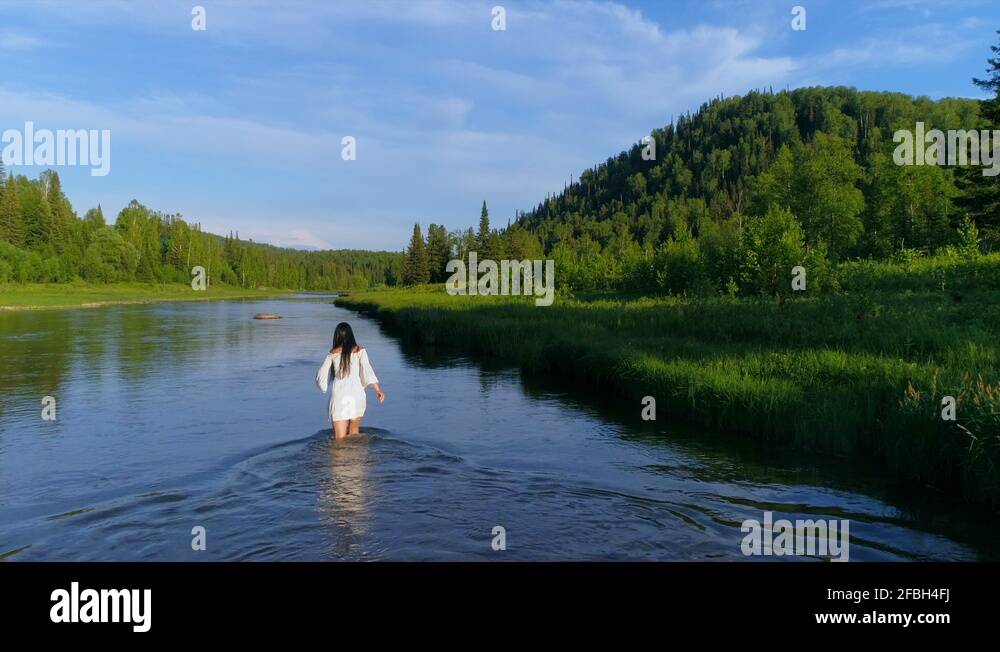 Woman wading in water in a dress Stock Videos & Footage - HD and 4K ...