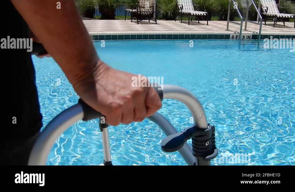 Handicap man with his walker by a pool Stock Video Footage - Alamy