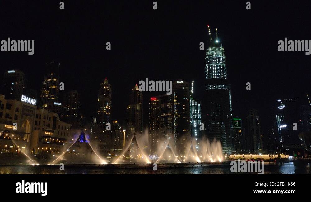Exploding towers of water fly up from the man-made lake in Dubai UAE ...