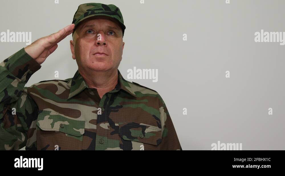Confident Soldier Salute with a Hand Gestures Shooting with White ...