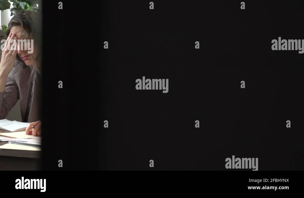 Woman with head on the desk overwhelmed Stock Videos & Footage - HD and ...