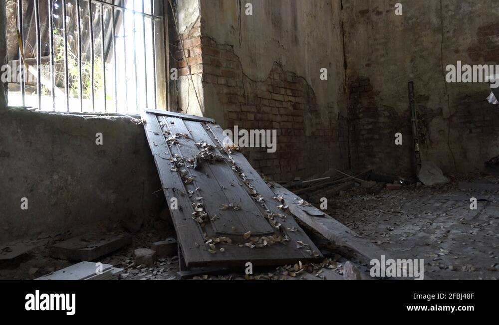 image of the inside of a old Prison in Mandalay, Myanmar. Its dark and ...