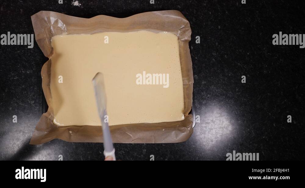 Lady Showing Finished Raw Batter Ready To Be Put Into Oven 4K 30FPS ...