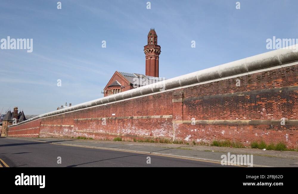 Static Shot of Perimeter Security Wall at HM Prison Manchester, England ...