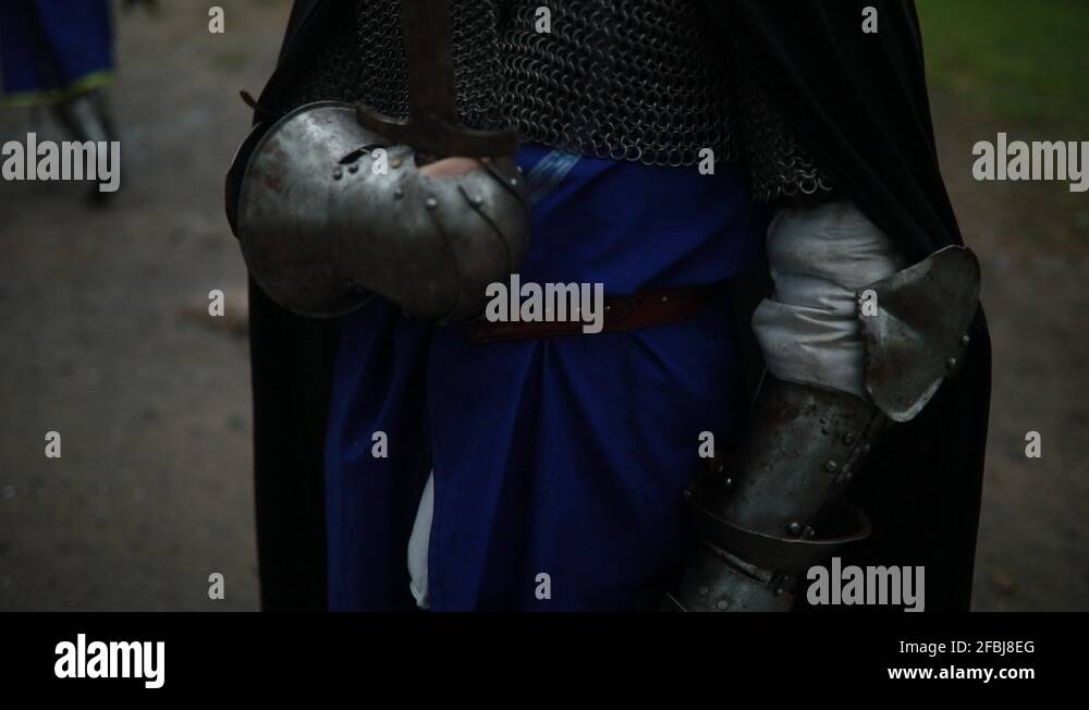 Portrait of a medieval knight in chain armor and with a sword Stock ...