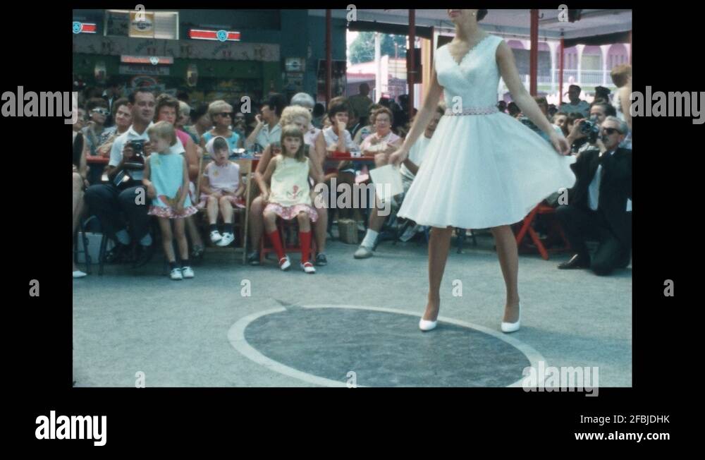 1960s: Beauty pageant contestants carry numbers across dance floor and ...
