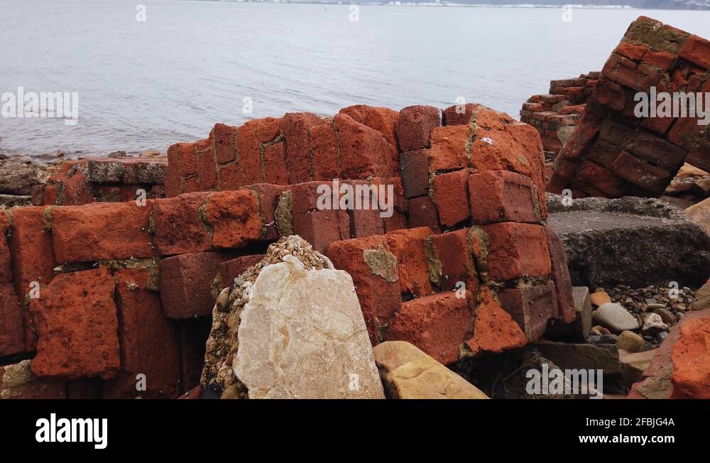 Rubble on beach Stock Videos & Footage - HD and 4K Video Clips - Alamy