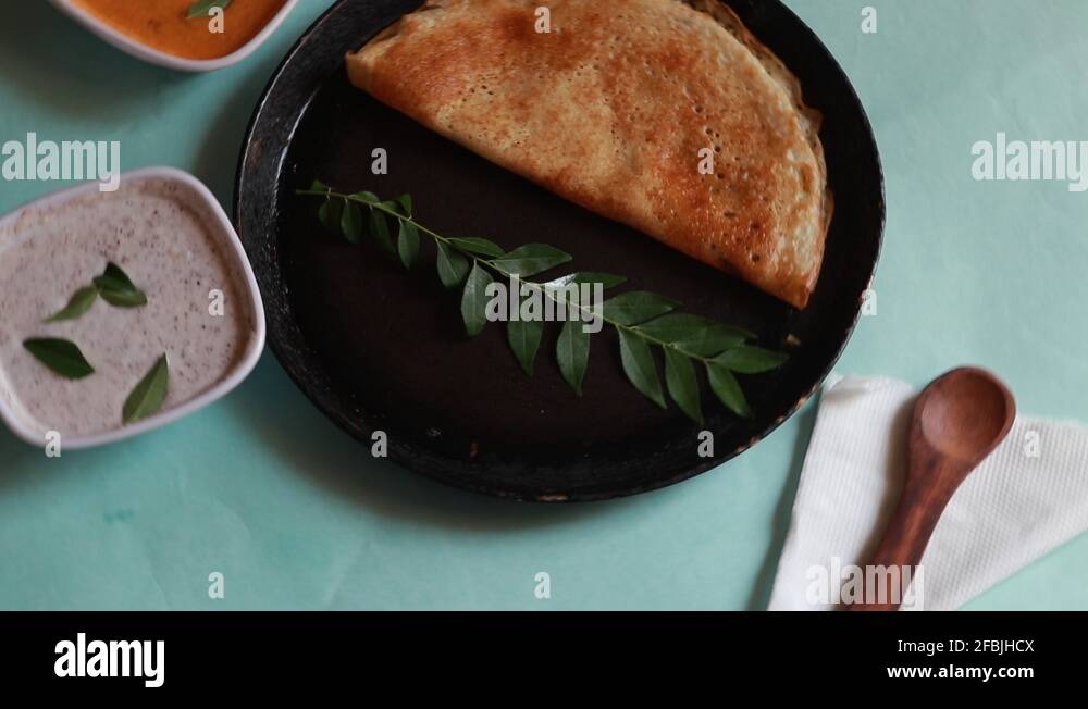 Rotating masala dosa,South Indian meal Set Dosa ,sambhar and coconut ...