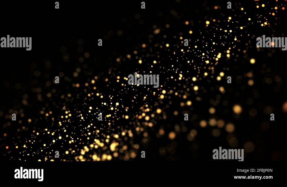 gold particles in liquid float and glisten. Background with glittering ...
