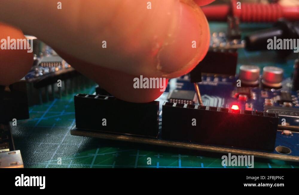Inserting wires in to arduino pins on workbench while arduino led is ...
