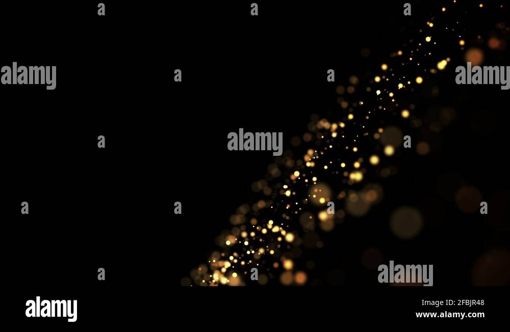 gold particles in liquid float and glisten. Background with glittering ...